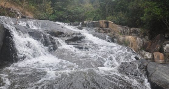 THE SCENIC MONUMENT OF SON LONG WATERFALL